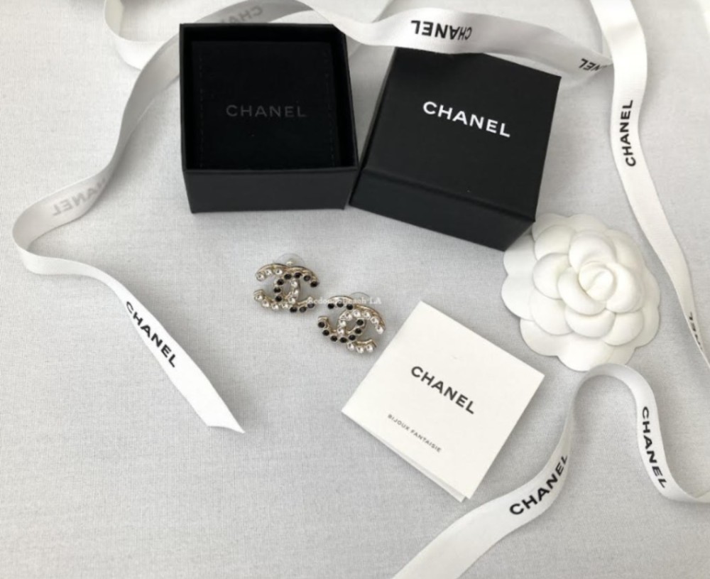 2024 Chanel earrings with gold closure and black and white crystal stud