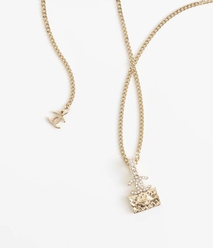 2024 Chanel Gold Chain Necklace with A Pendant with A Chanel Bag in The Middle Inlaid with Crystals